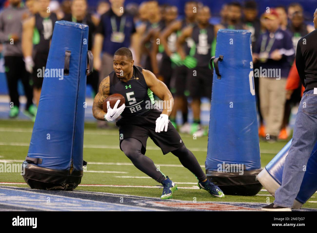 Illinois State running back Marshaun Coprich runs a drill at the NFL ...
