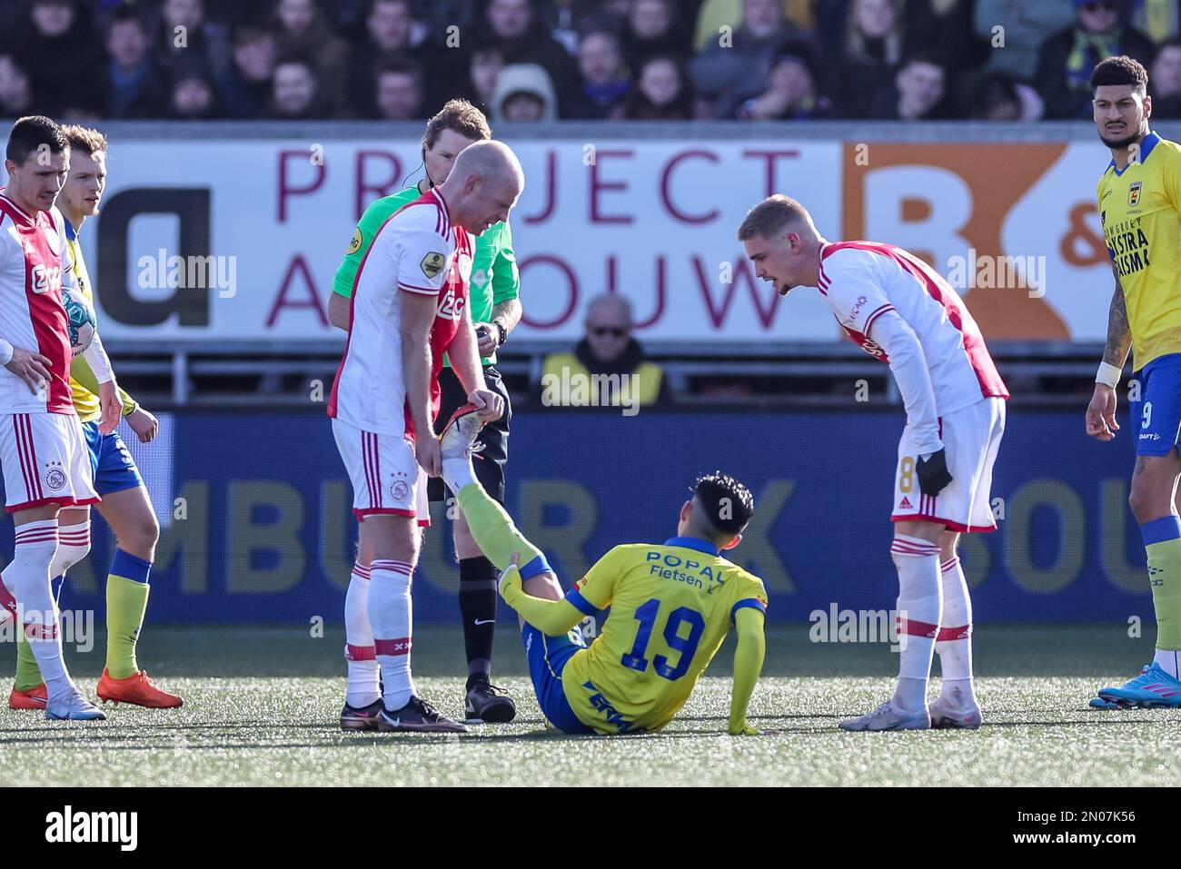 LEEUWARDEN, NETHERLANDS - FEBRUARY 5: Davy Klaassen of Ajax helps ...