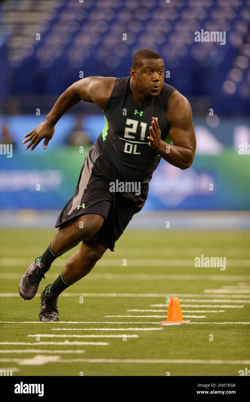 LSU offensive lineman Jerald Hawkins runs a drill at the NFL football ...