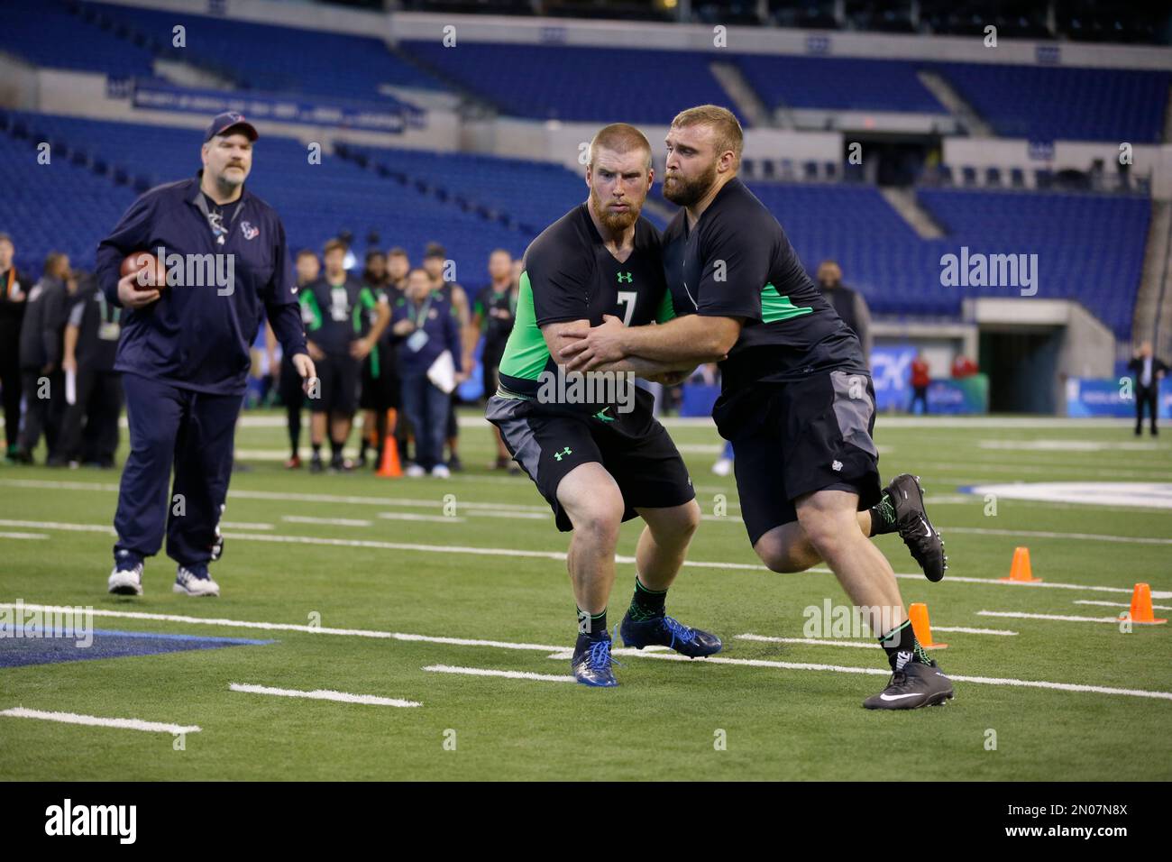 UCLA offensive lineman Jake Brendel, left, blocks Michigan State ...