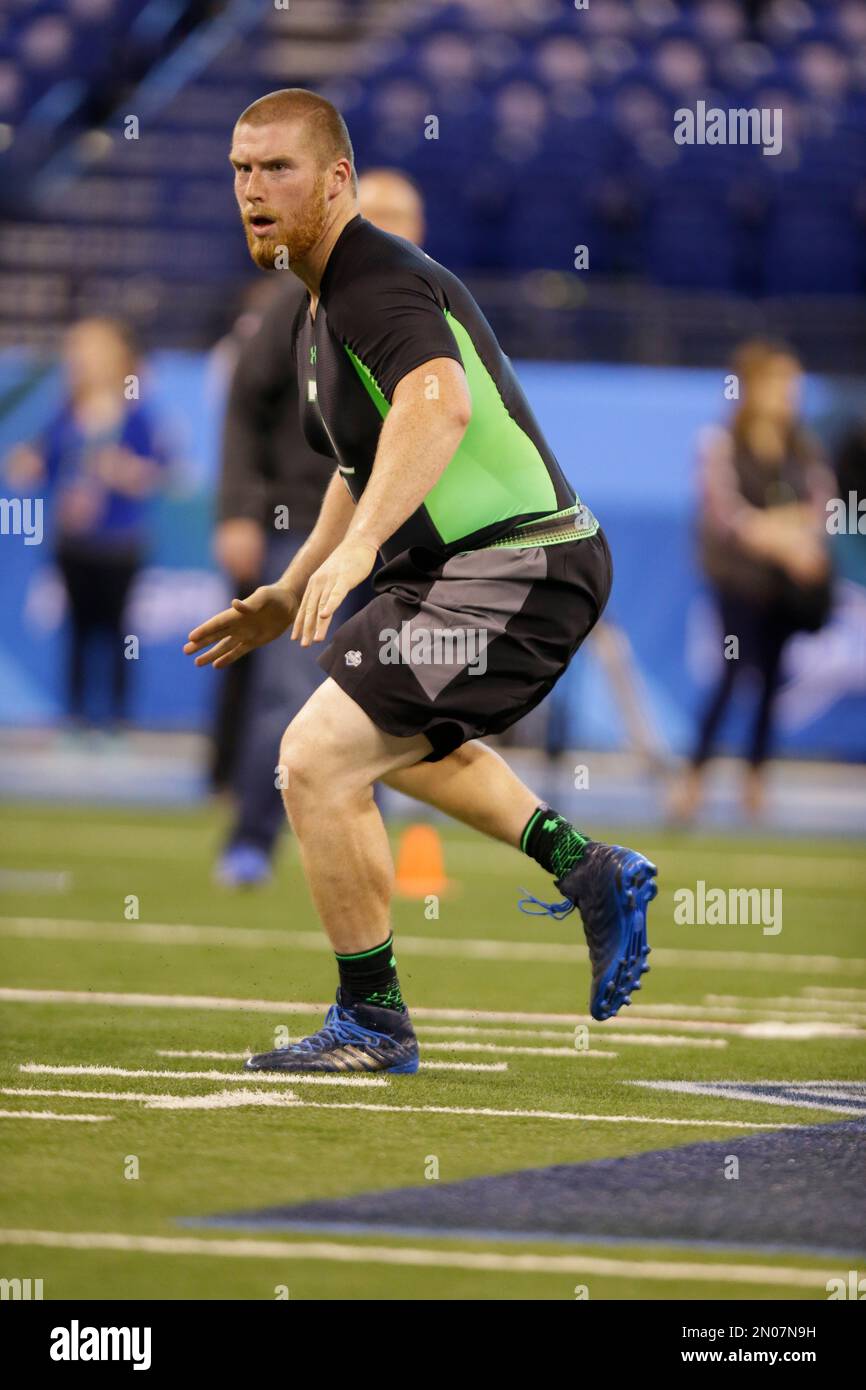 UCLA offensive lineman Jake Brendel runs a drill at the NFL football ...