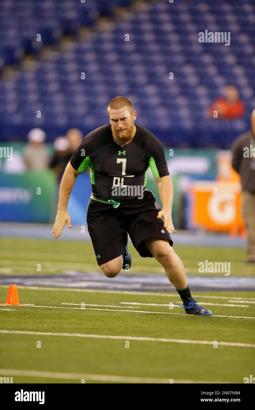 UCLA offensive lineman Jake Brendel runs a drill at the NFL football ...