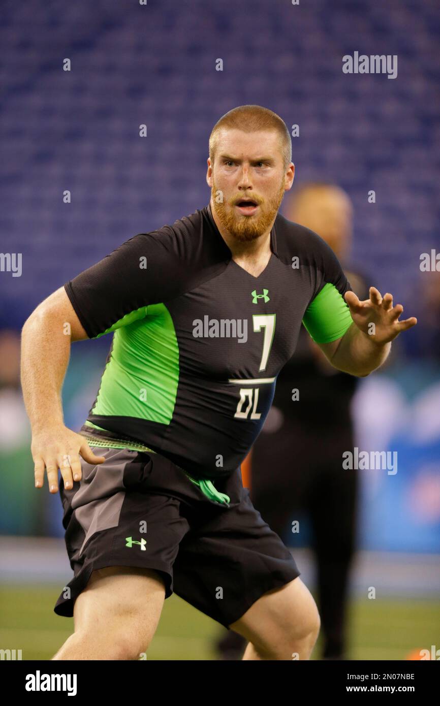 UCLA offensive lineman Jake Brendel runs a drill at the NFL football ...