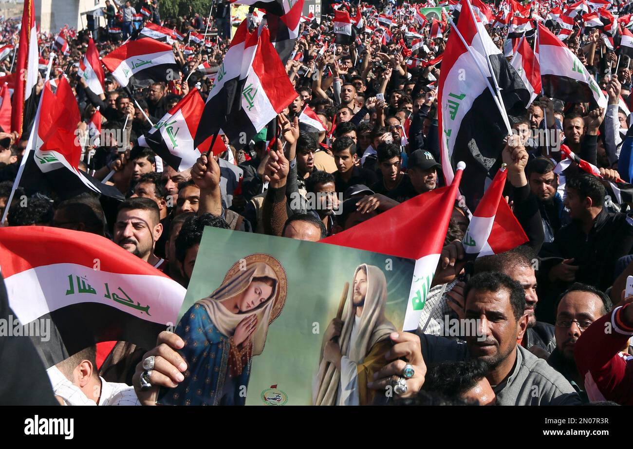 Followers of Iraq's influential Shiite cleric Muqtada al-Sadr take part ...