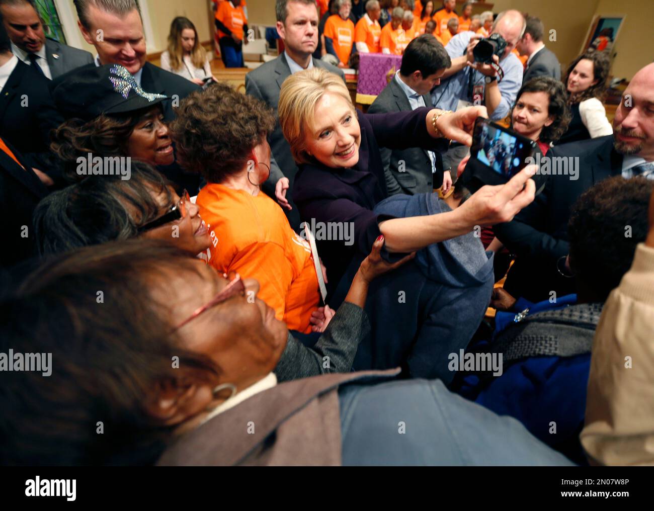 Democratic presidential candidate Hillary Clinton takes photos with ...