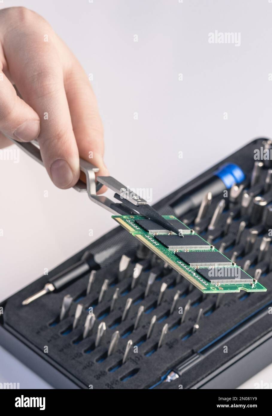 Technician fixing computer. Repair and upgrade concept of laptop ...