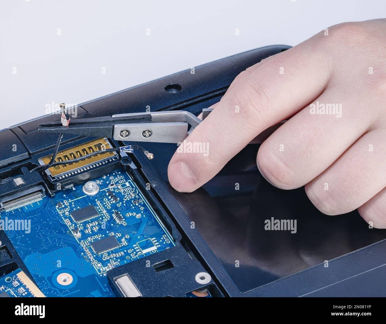 Technician fixing computer. Repair and upgrade concept of laptop ...