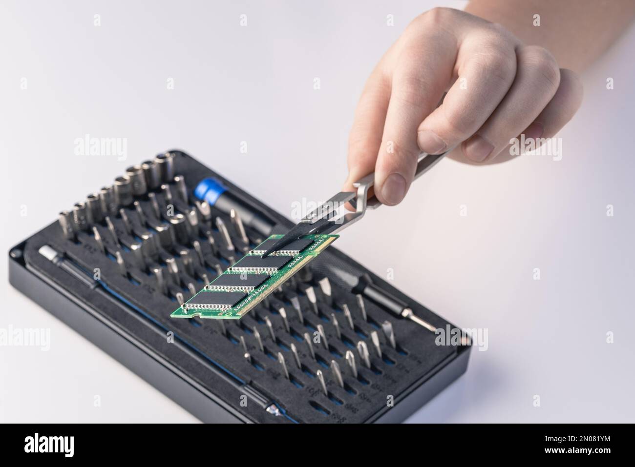 Technician fixing computer. Repair and upgrade concept of laptop ...