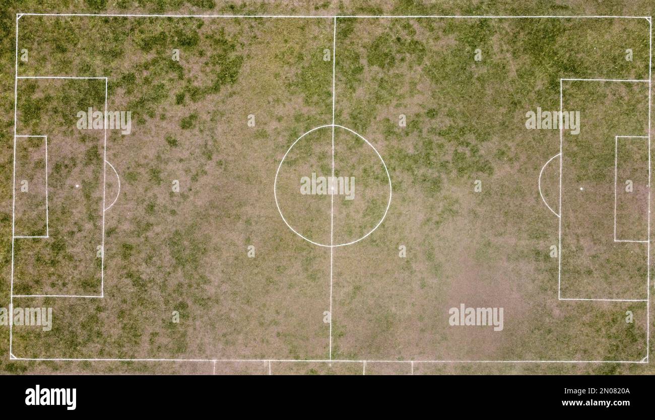 A top view on a soccer pitch with deteriorated grass surface Stock ...