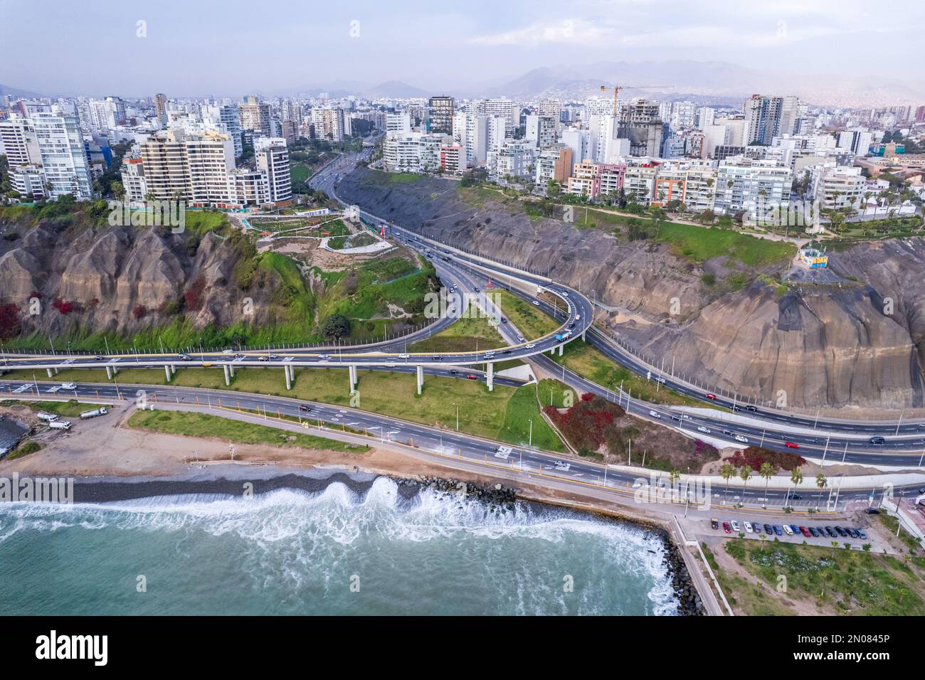 Aerial view of La Costa Verde and the Miraflores boardwalk in Lima ...