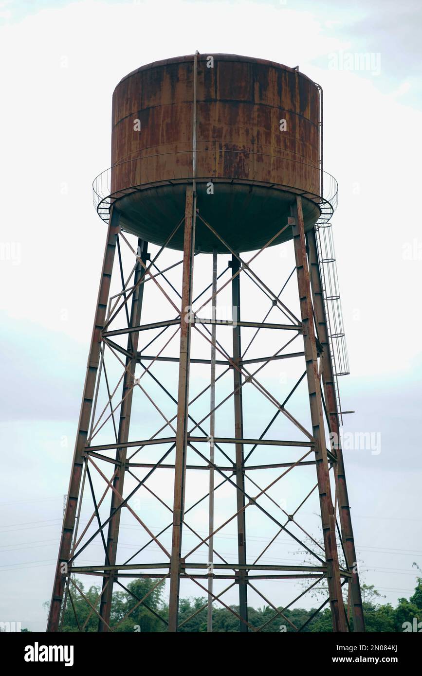 A vertical shot of old Water tower on sky background Stock Photo - Alamy