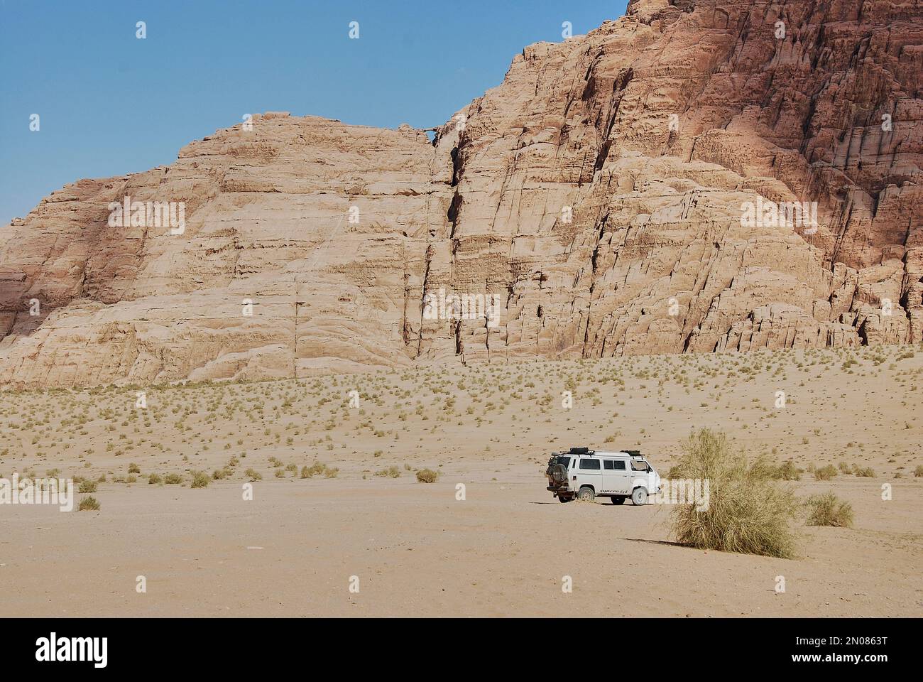 old adventurous VW Kombi Syncro 4WD van in rocky landscape of the arid ...