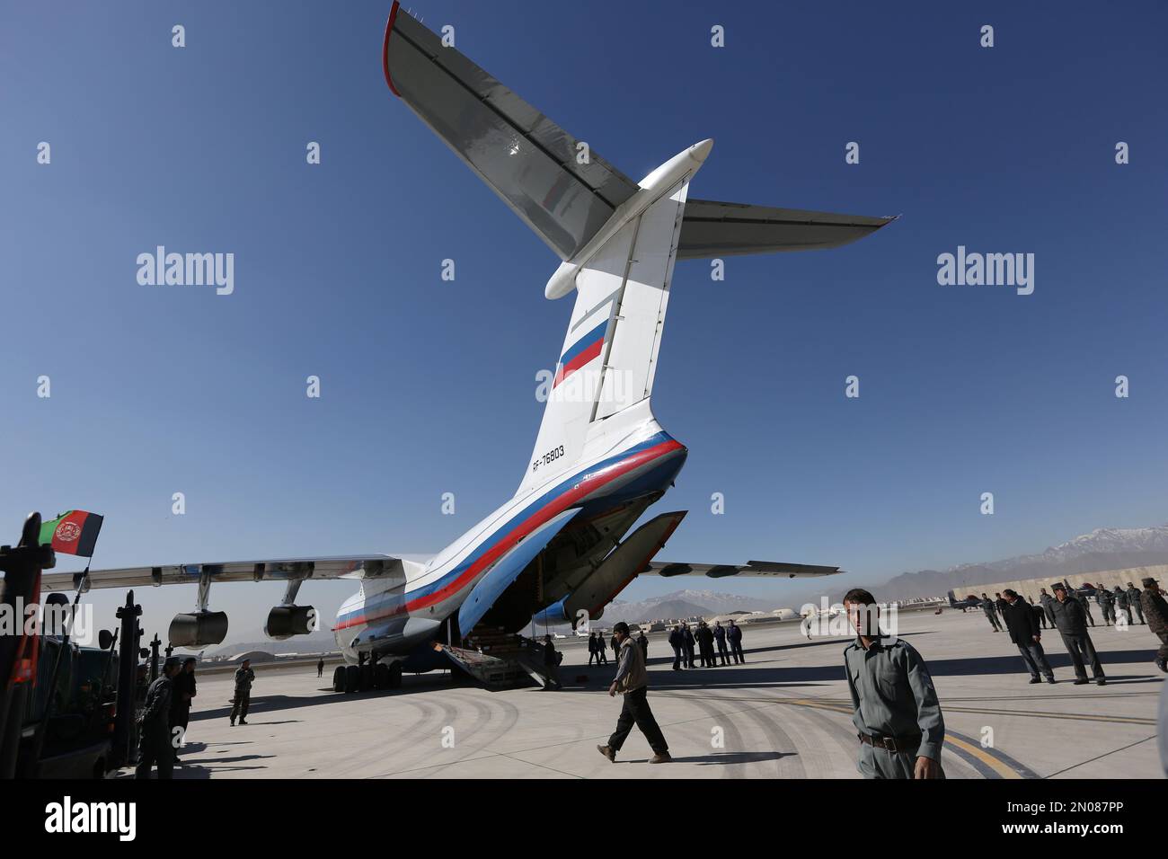 Afghan National security forces gather around a Russian aircraft at ...