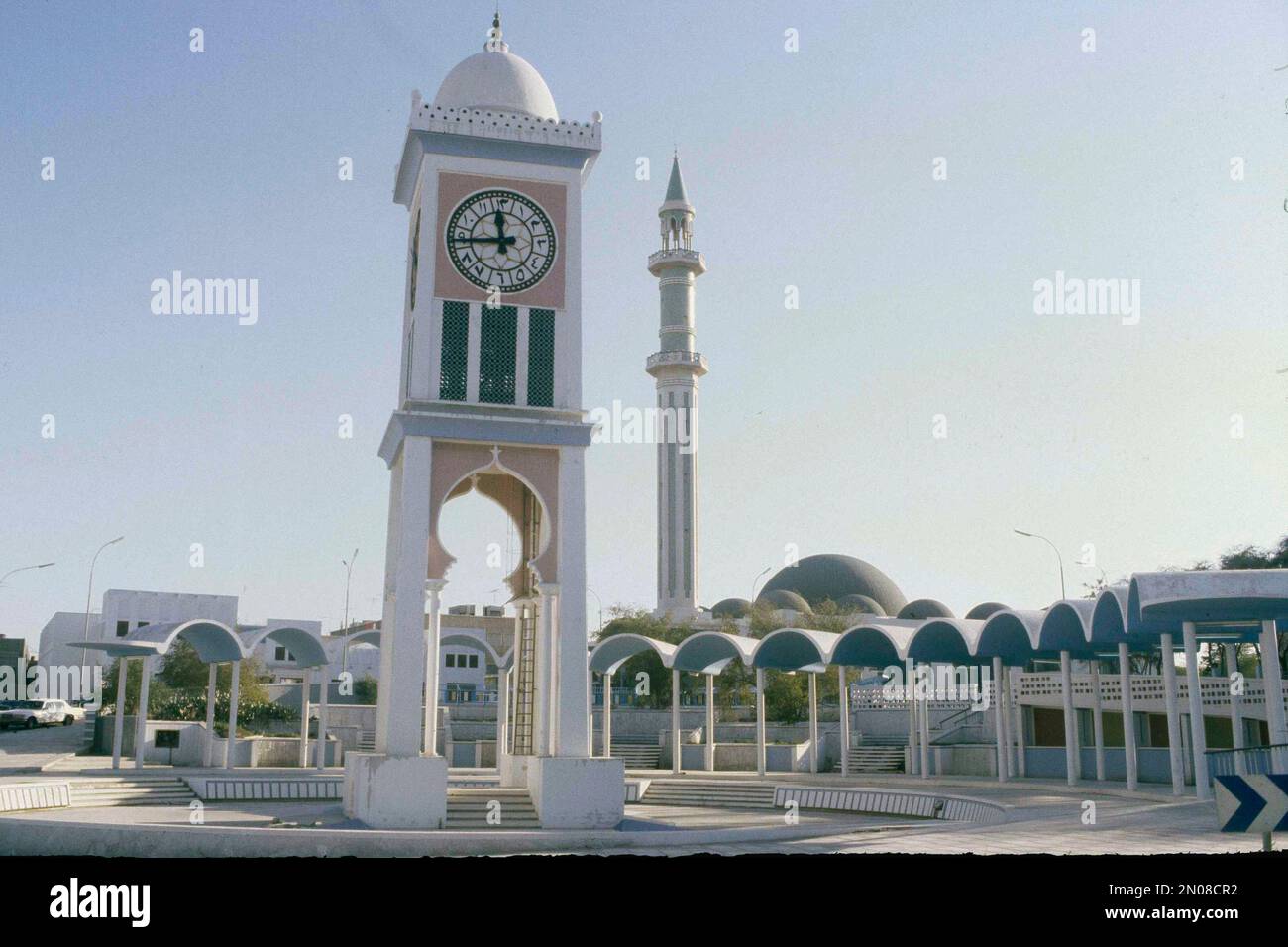 The Doha clock tower with a minaret in the background is pictured in ...