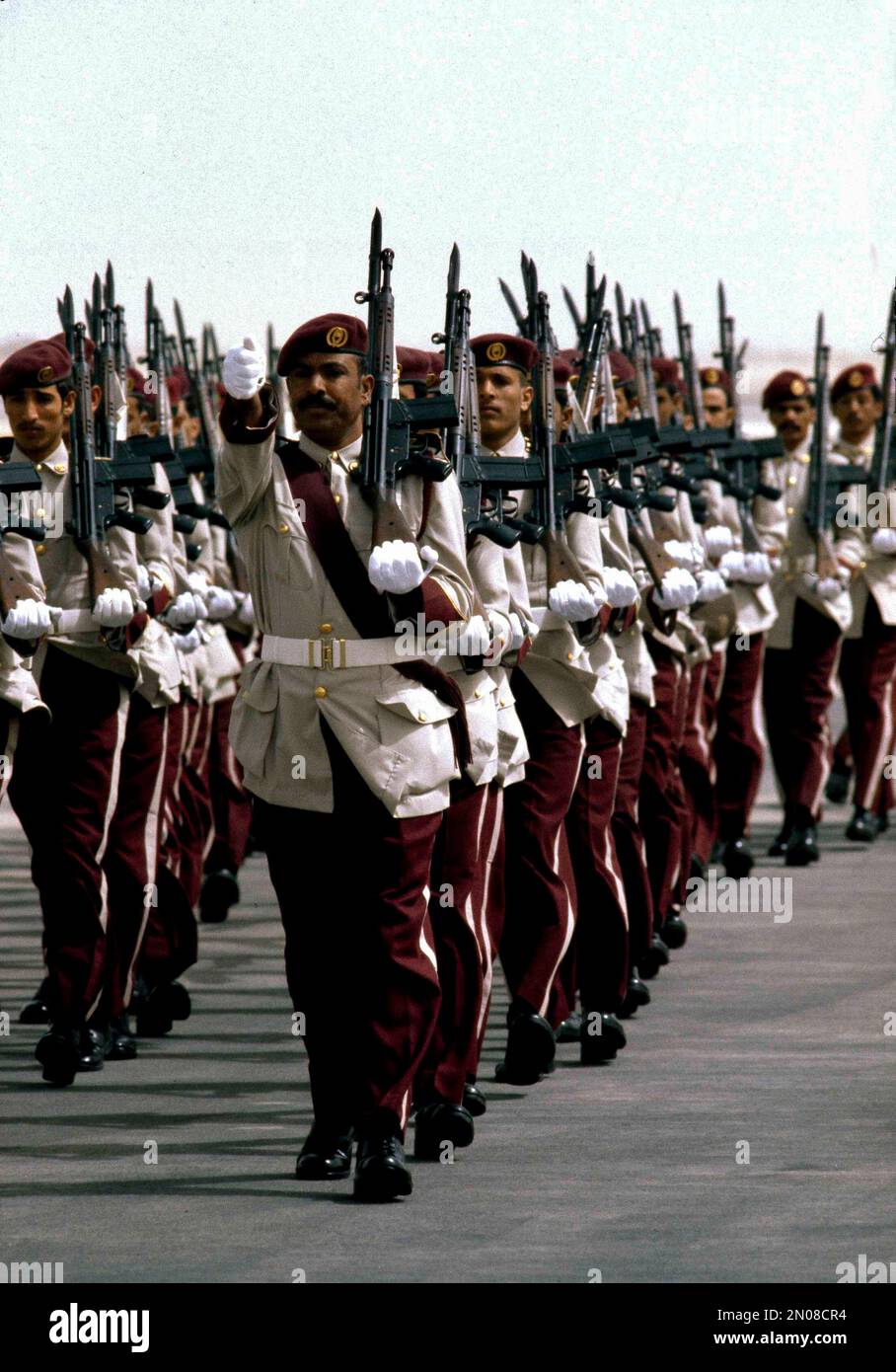 An honor guard marches at the Doha, Qatar airport, March 1980. (AP ...