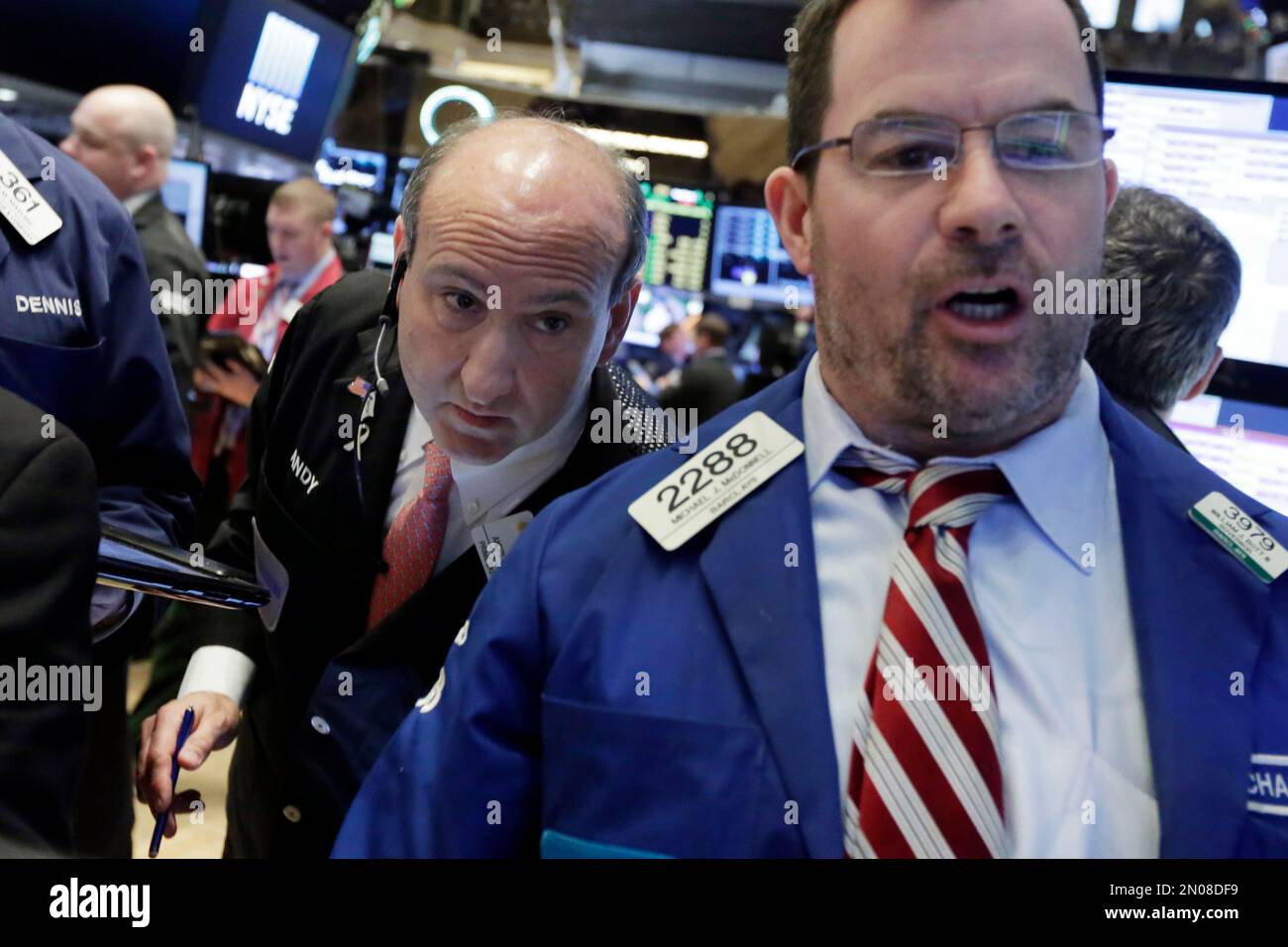 Trader Andrew Silverman, left, and specialist Michael McDonnell work on ...