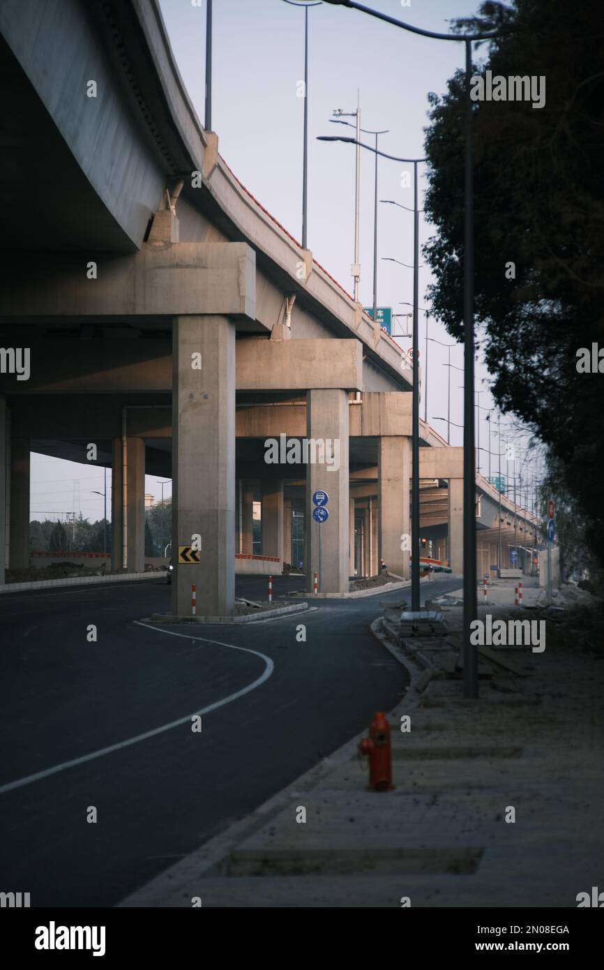 Viaduct bridge piers at sunset Stock Photo - Alamy