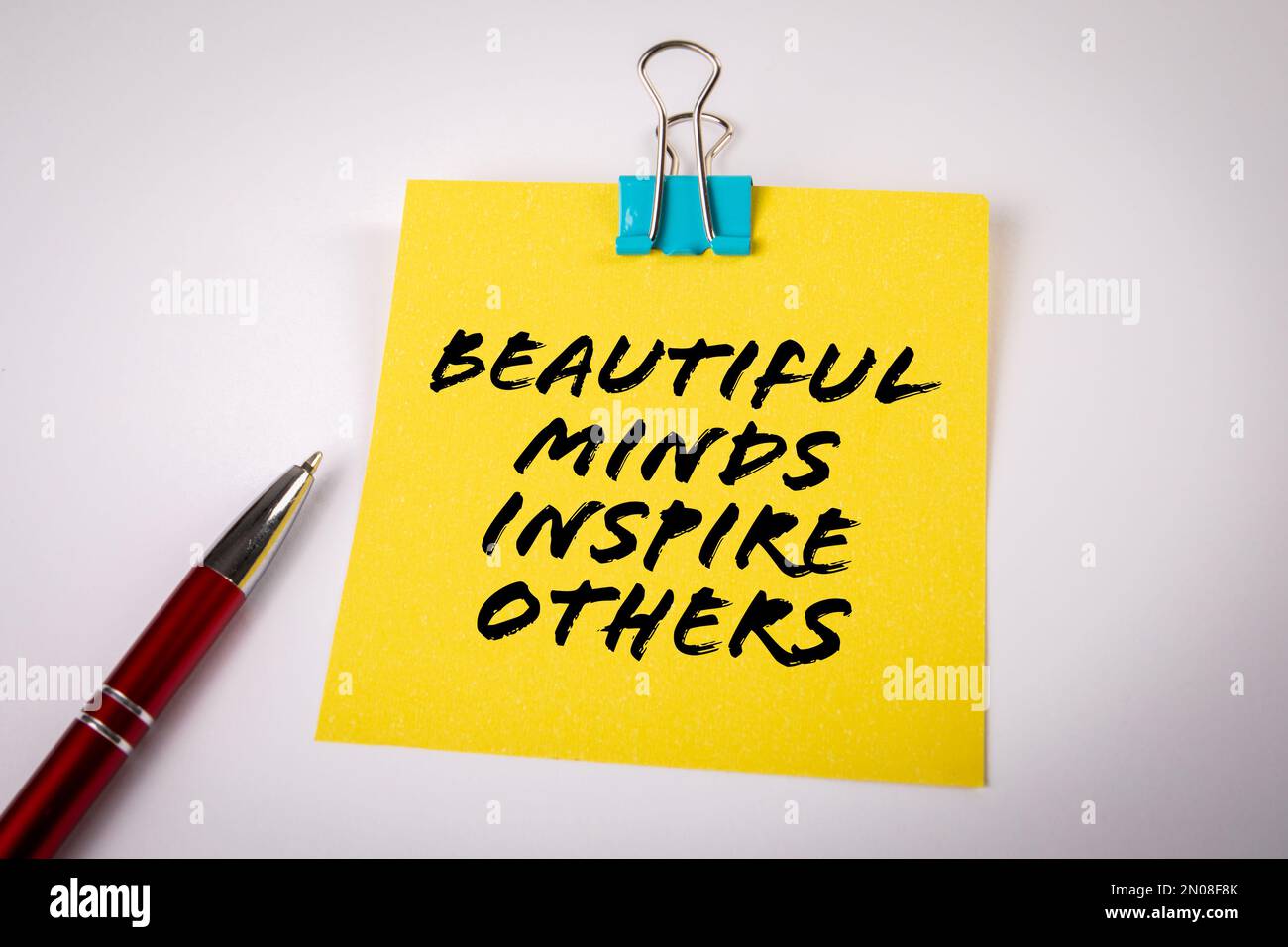 Beautiful Minds inspire others. Yellow piece of paper with text Stock ...