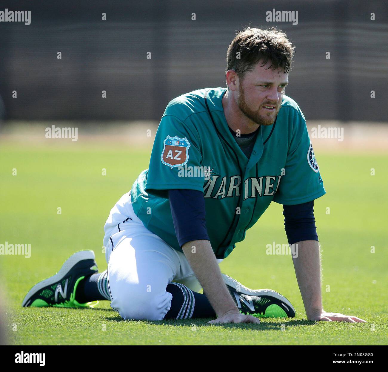 Seattle Mariners' Charlie Furbush stretches during spring training ...
