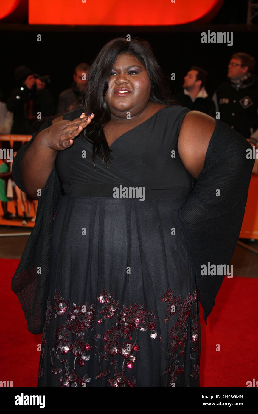 Actress Gabourey Sidibe poses for photographers upon arrival at the ...
