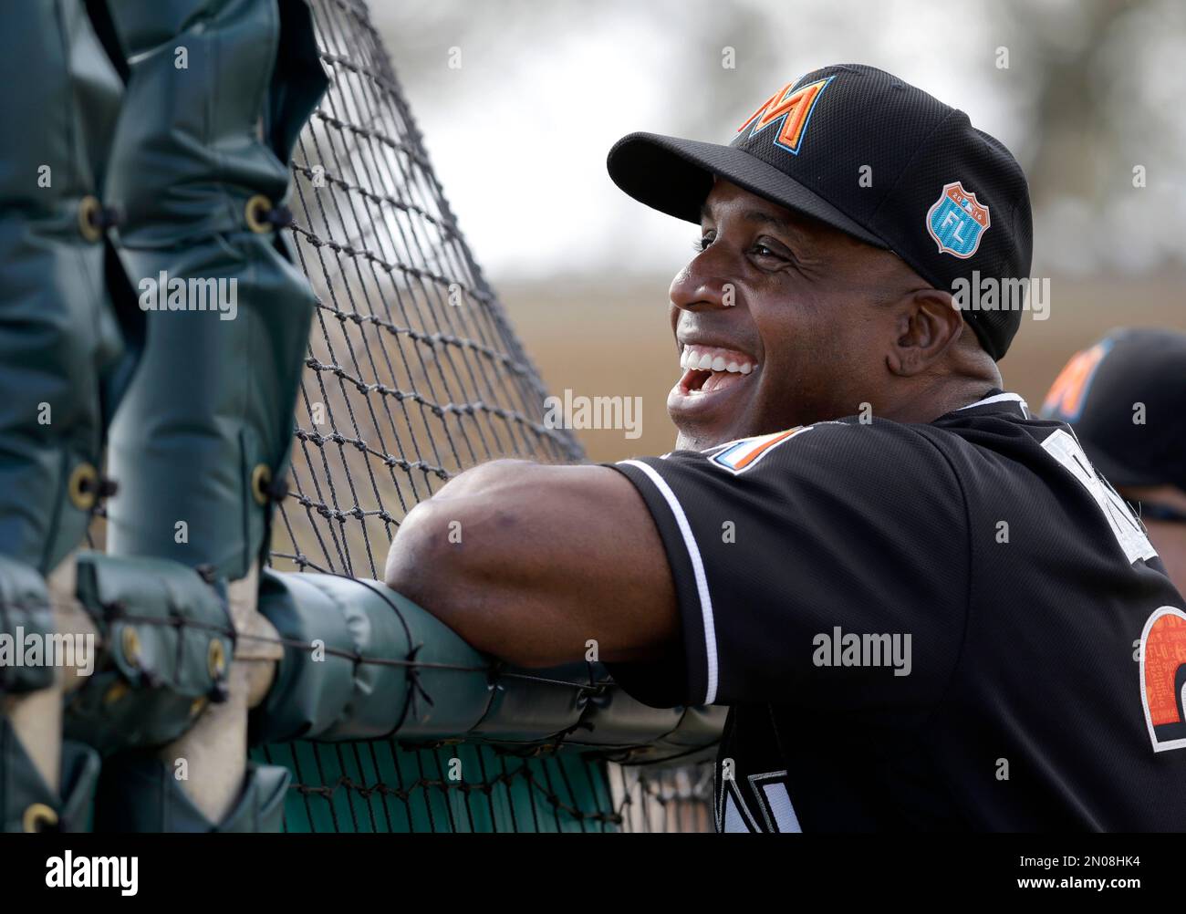 Miami Marlins hitting coach Barry Bonds smiles as he watches spring ...