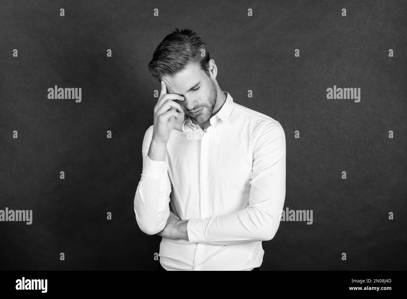 Terrible pain. Businessman suffering from headache. Headache attack ...