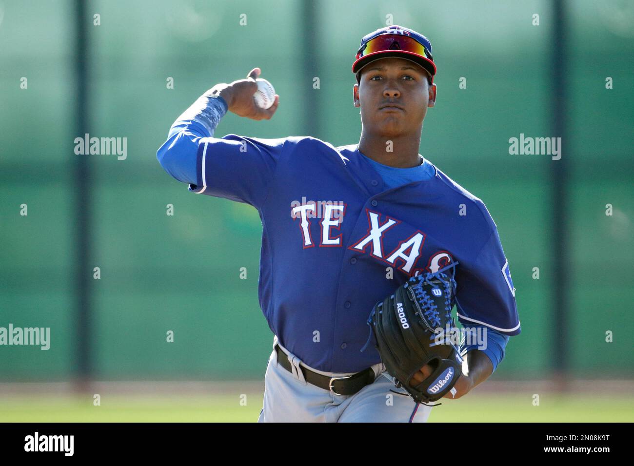 Texas Rangers pitcher Jose Leclerc throws during spring training ...