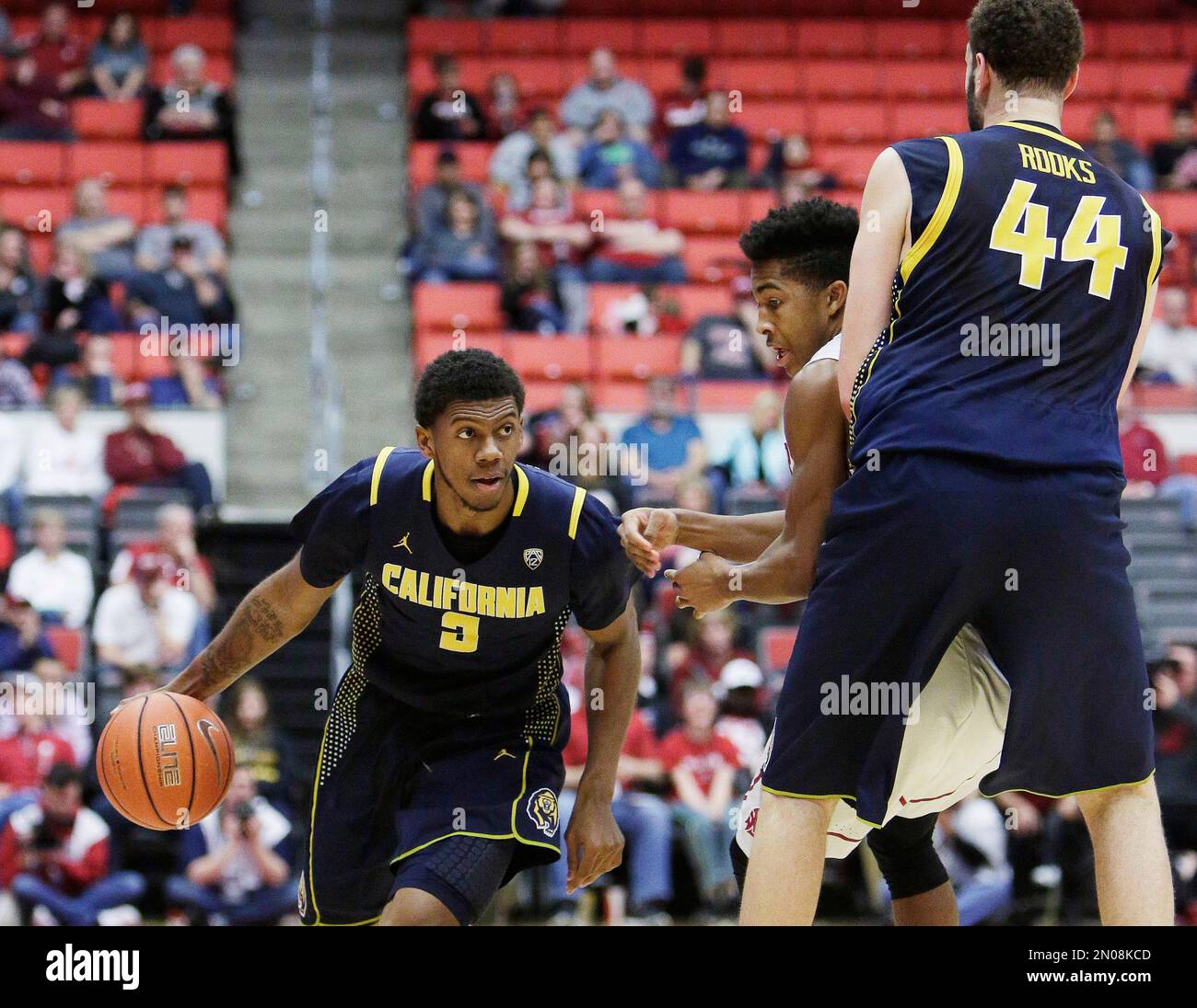 California's Tyrone Wallace (3) drives around Washington State's Ny ...