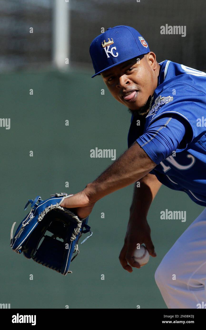 Kansas City Royals pitcher Edinson Volquez fields a ball during spring ...