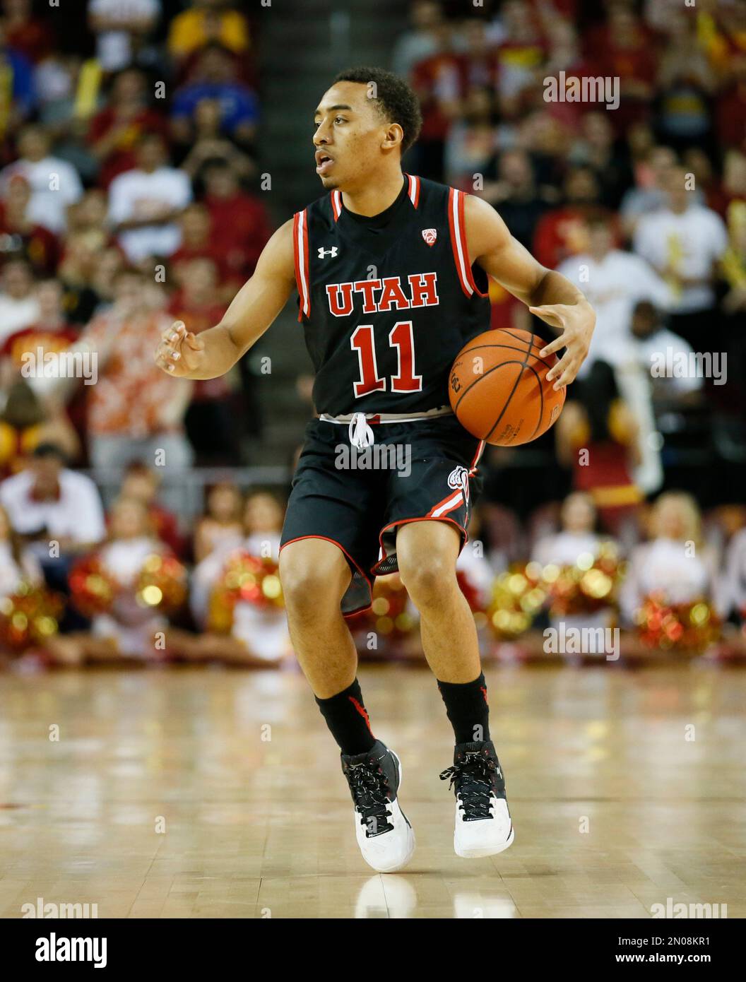 Utah's Brandon Taylor dribbles against Southern California during the ...