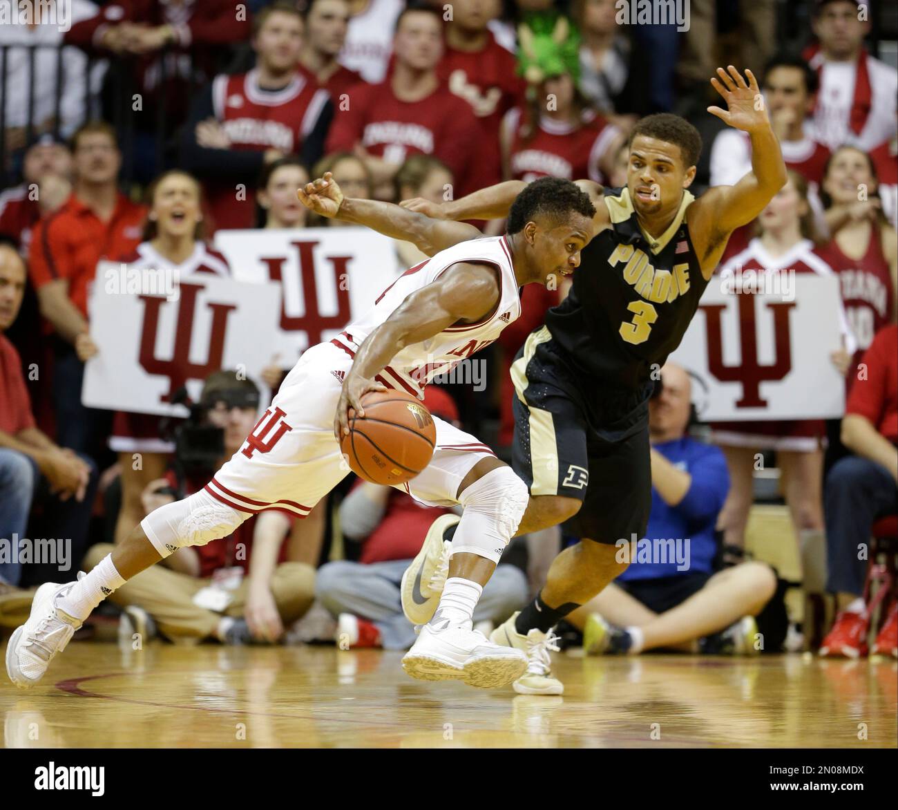Indiana guard Yogi Ferrell (11)drives on Purdue guard P.J. Thompson (3 ...