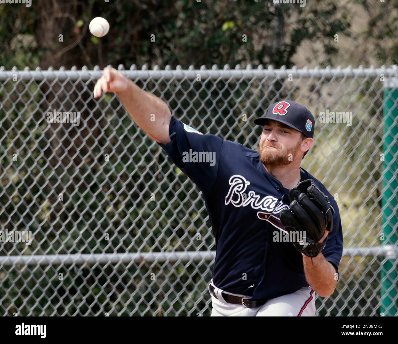 Atlanta Braves pitcher Chris Withrow throws during a spring training ...