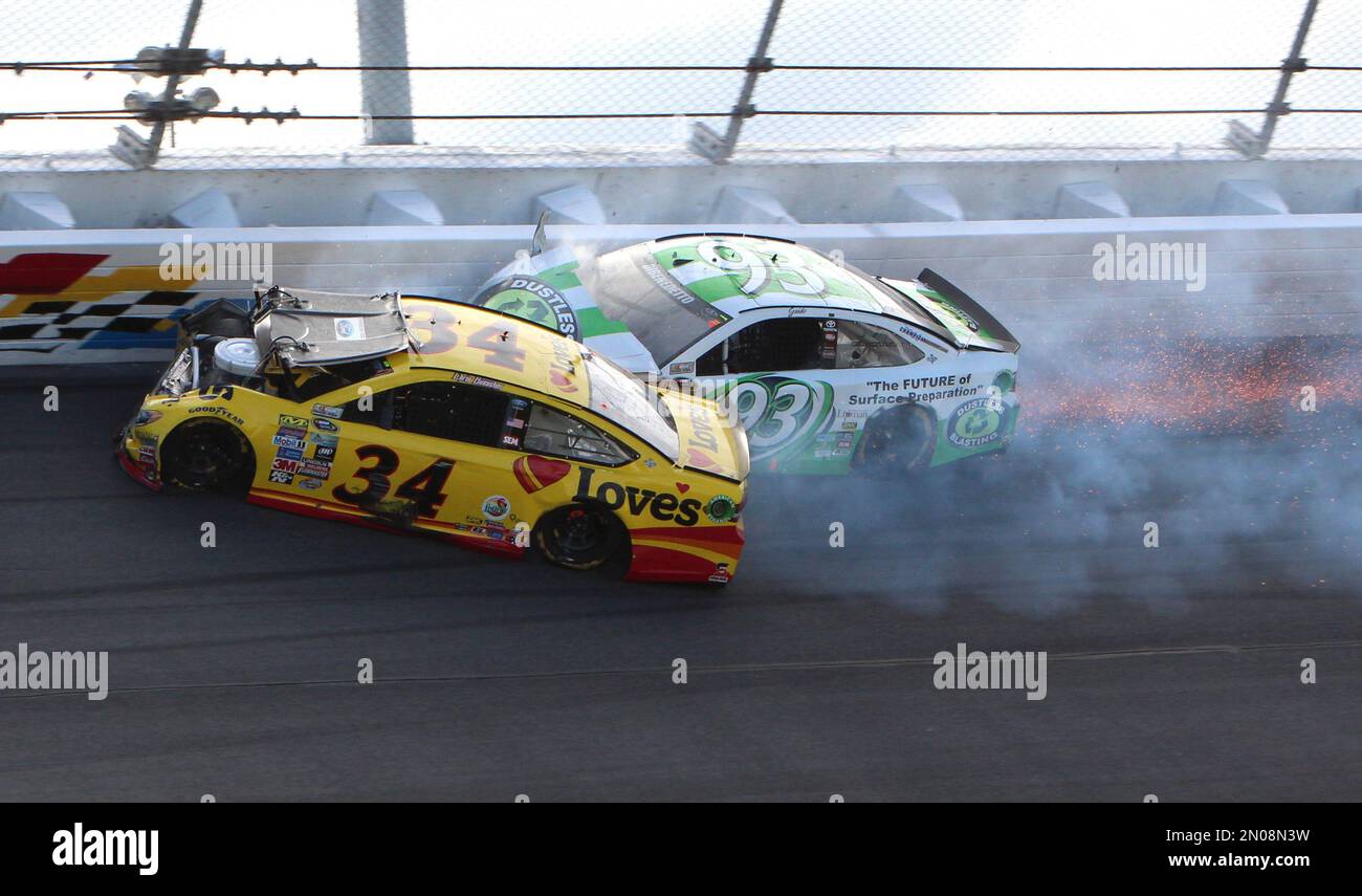 Chris Buescher (34) and Matt DiBenedetto (93) crash during the NASCAR ...