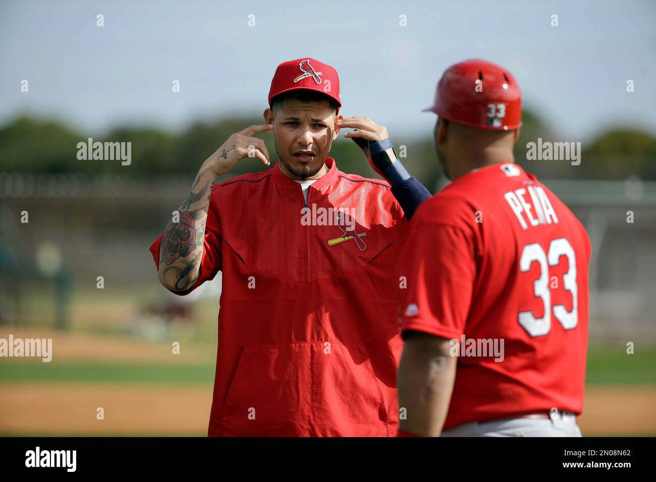 St. Louis Cardinals catchers Yadier Molina, left, and Brayan Pena talk ...