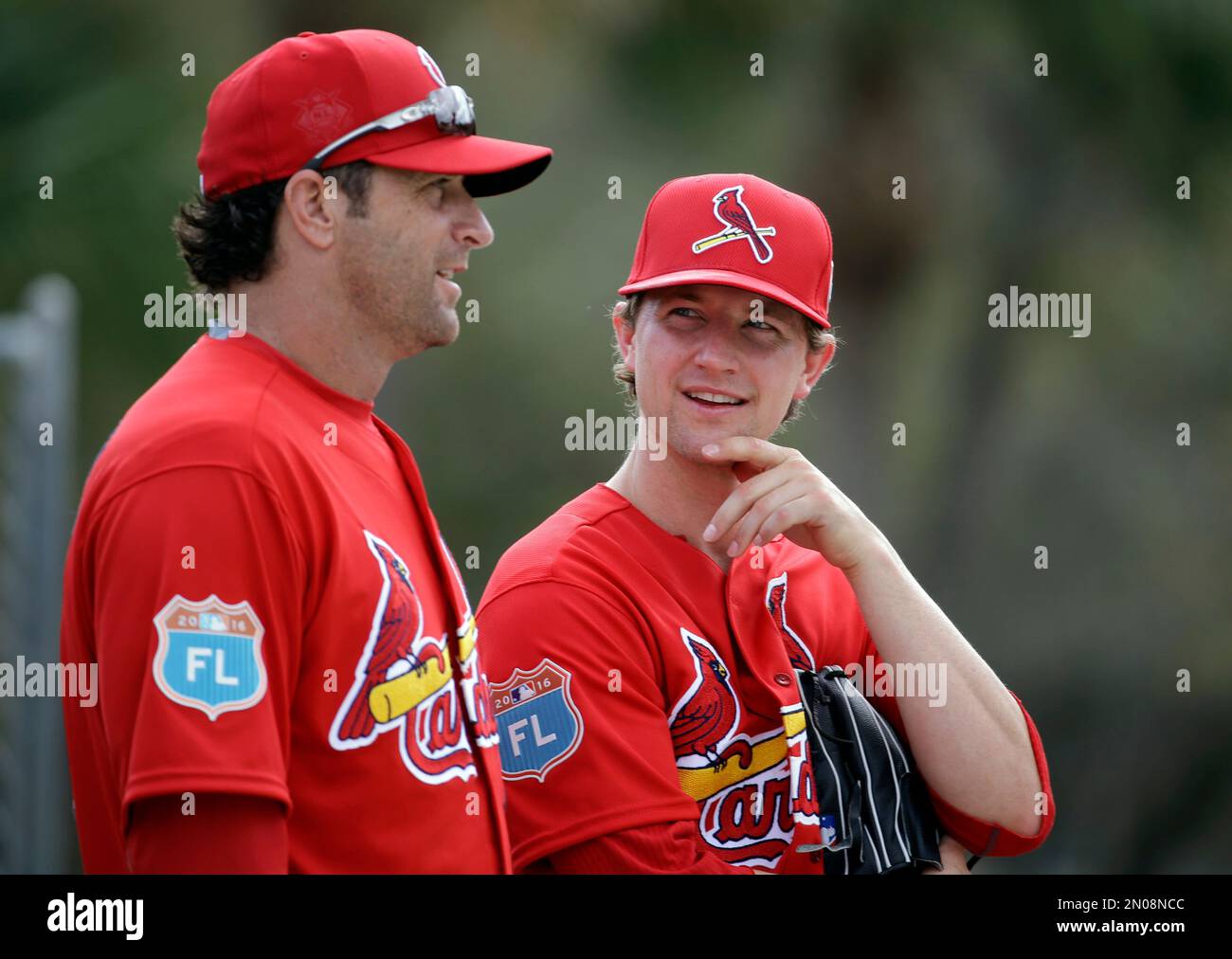 St. Louis Cardinals pitcher Mike Leake, right, talks with manager Mike ...