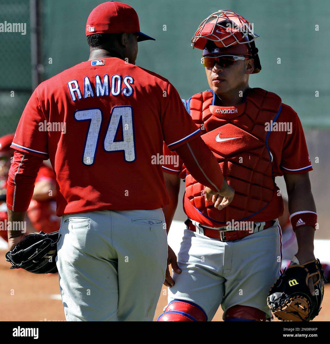 Philadelphia Phillies catcher Carlos Ruiz, right, talks to pitcher ...