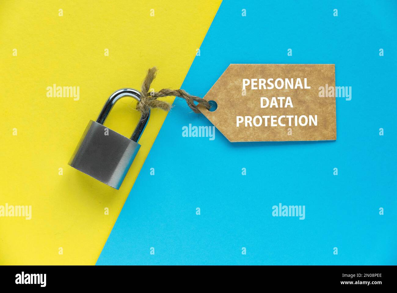 A padlock with number attached to a tag written with Personal Data ...