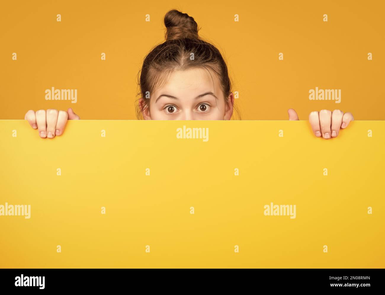 School kid hiding copy hi-res stock photography and images - Alamy