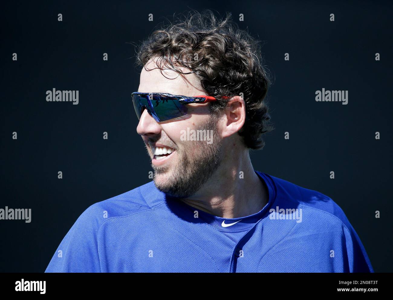 Chicago Cubs starting pitcher John Lackey runs during a spring baseball ...