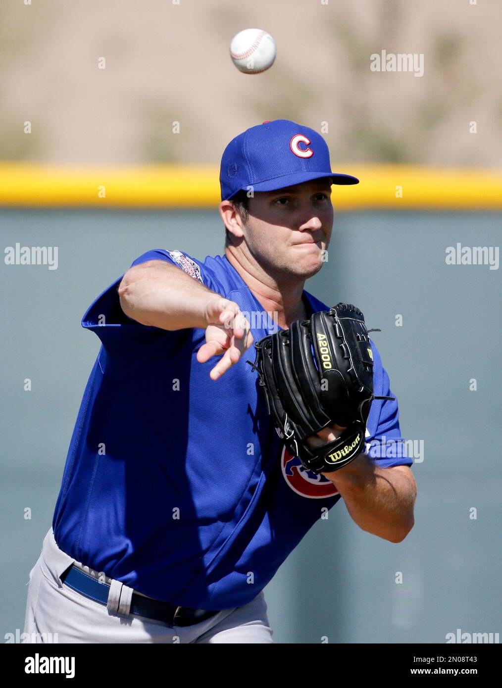 Chicago Cubs starting pitcher Adam Warren throws during a spring ...