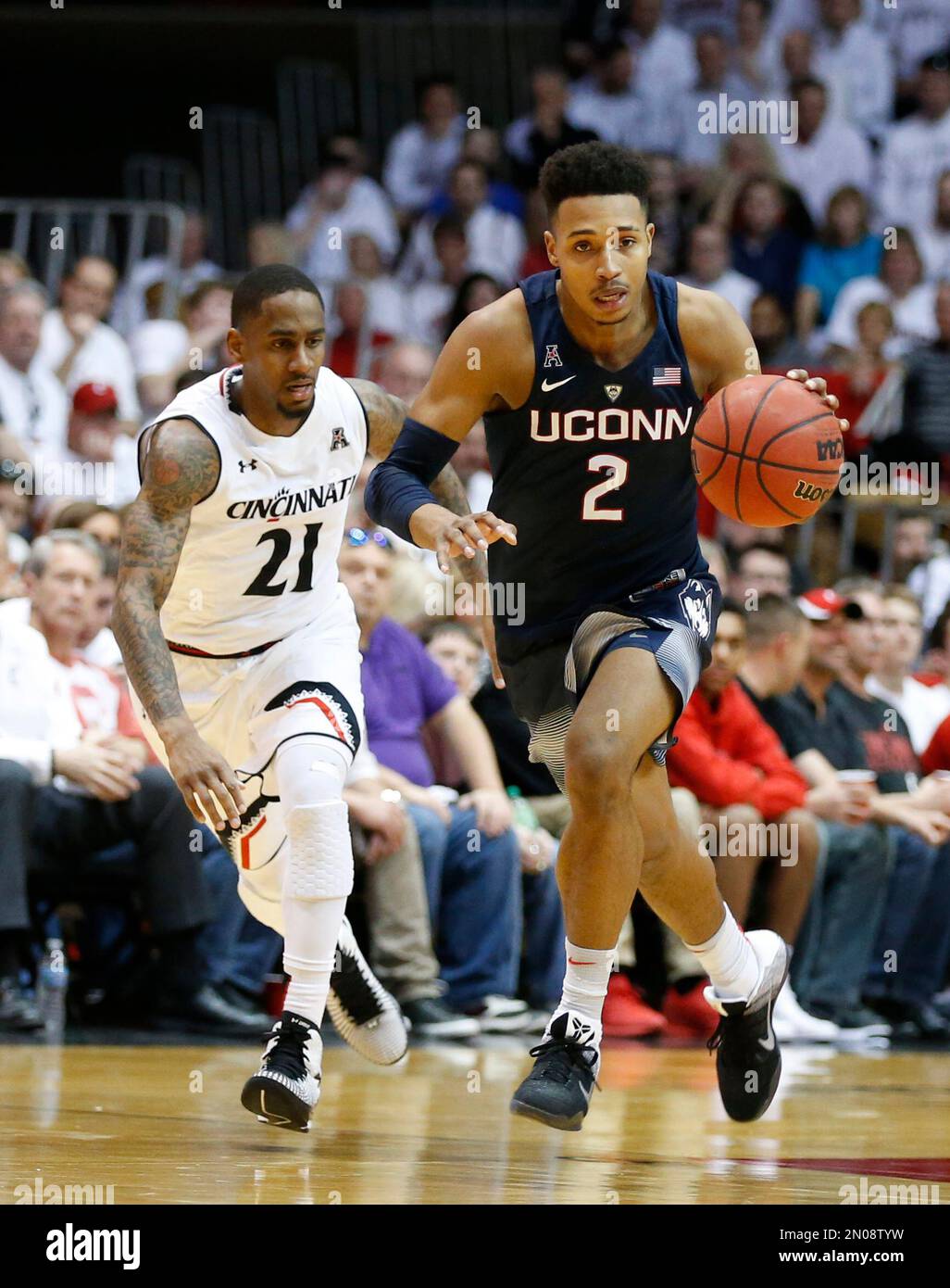 Connecticut guard Jalen Adams (2) drives up court against Cincinnati ...