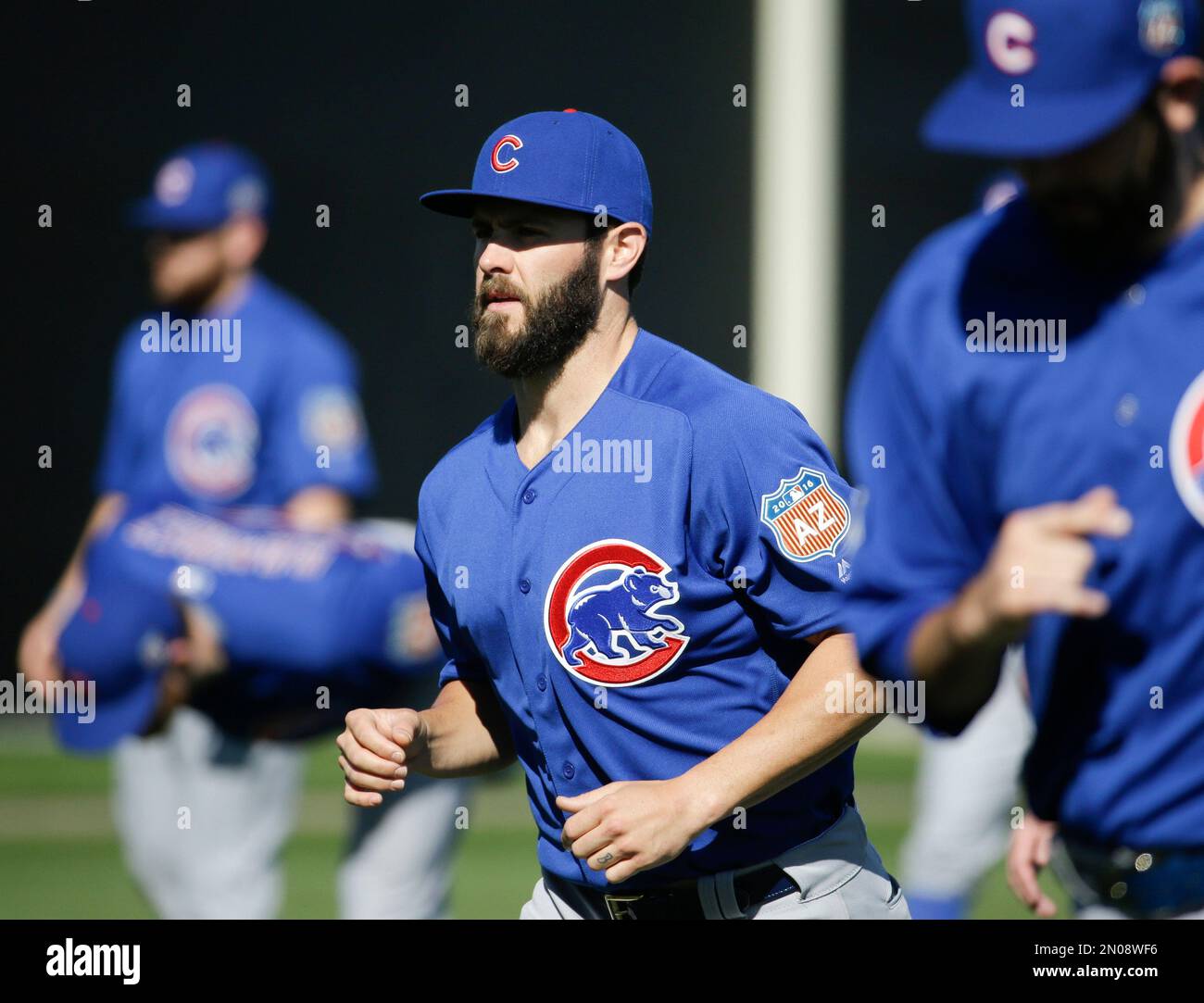 Chicago Cubs starting pitcher Jake Arrieta runs during a spring ...