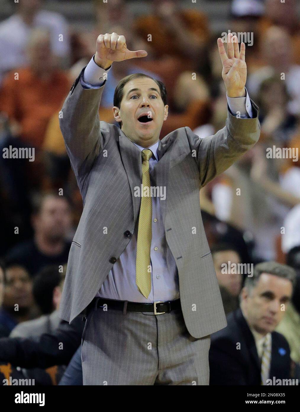 Baylor head coach Scott Drew signals to his players during the first ...