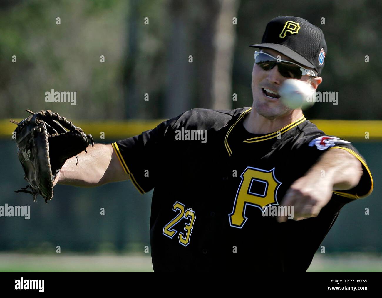 Pittsburgh Pirates first baseman Jake Goebbert fires the ball home ...