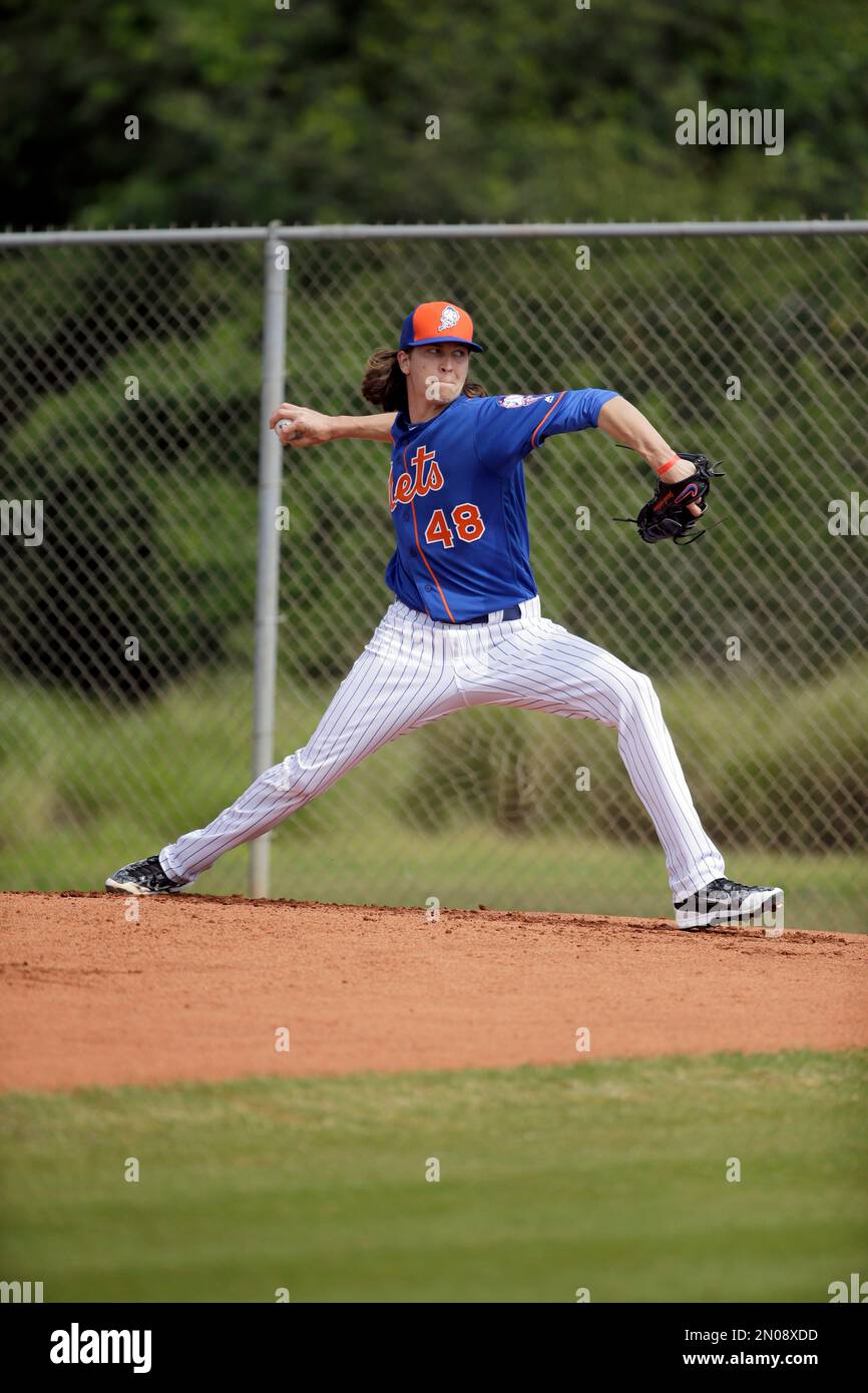 New York Mets pitcher Jacob deGrom throws a bullpen session during ...