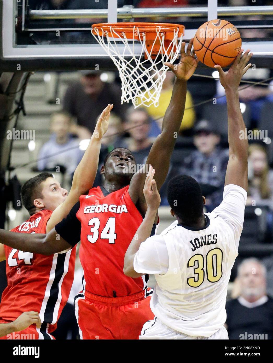 Georgia forward Derek Ogbeide (34) blocks a shot by Vanderbilt center ...