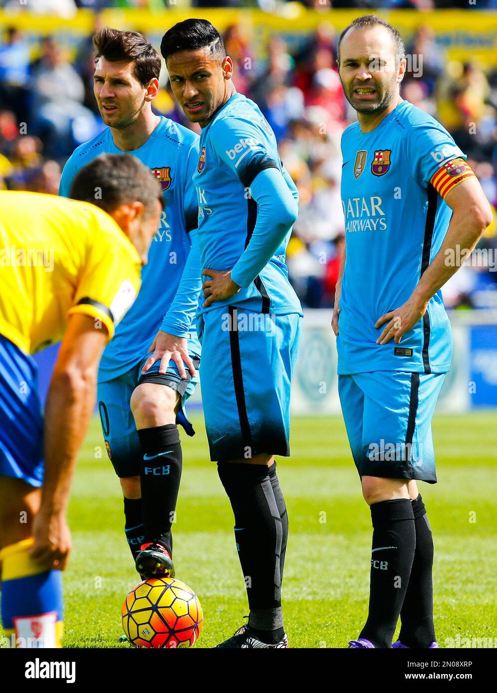 Barcelona's Lionel Messi, Neymar and Andres Iniesta wait to restore the ...