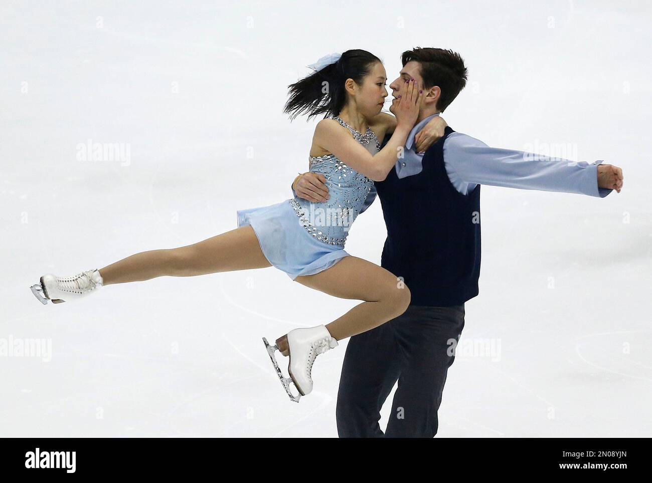 Sumire Suto and Francis Boudreau Audet of Japan perform during the ...