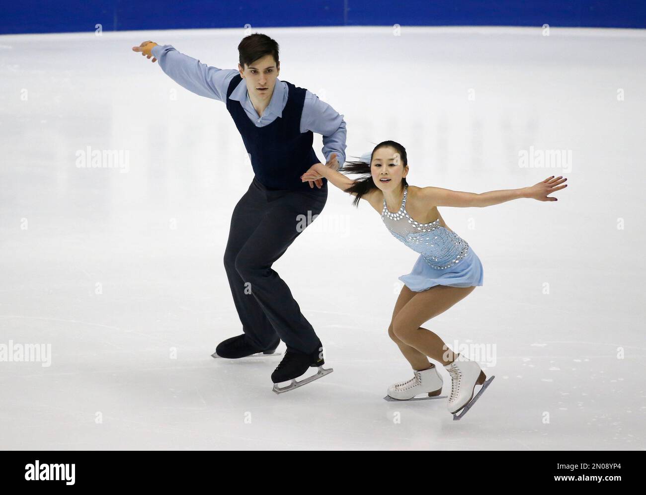 Sumire Suto and Francis Boudreau Audet of Japan perform during the ...