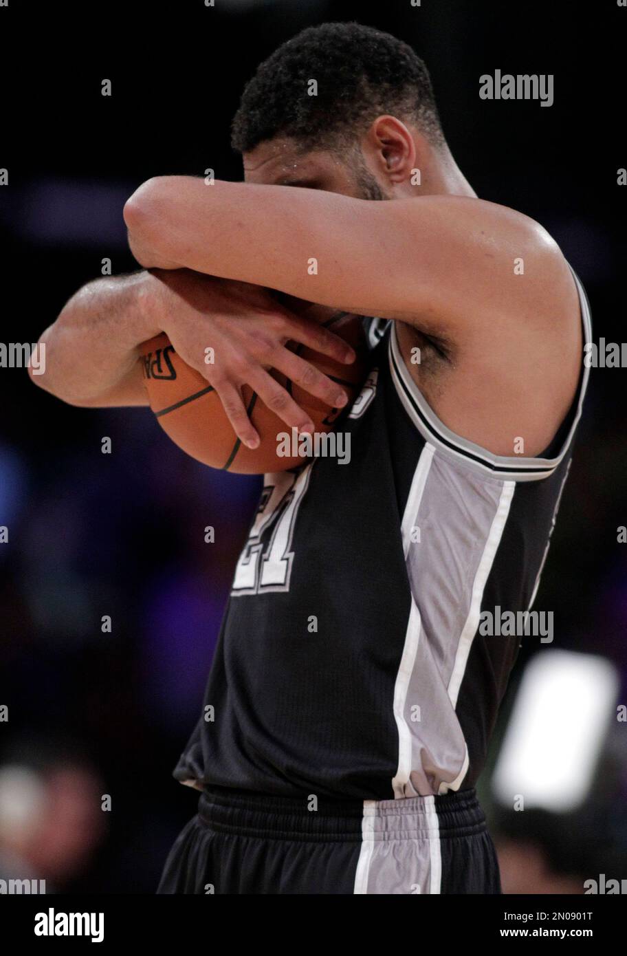 San Antonio Spurs center Tim Duncan grabs the game ball before an NBA ...
